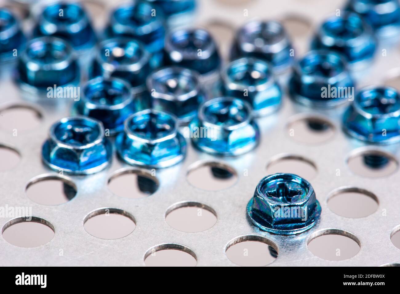 Set of screw on round hole perforated plate Stock Photo - Alamy