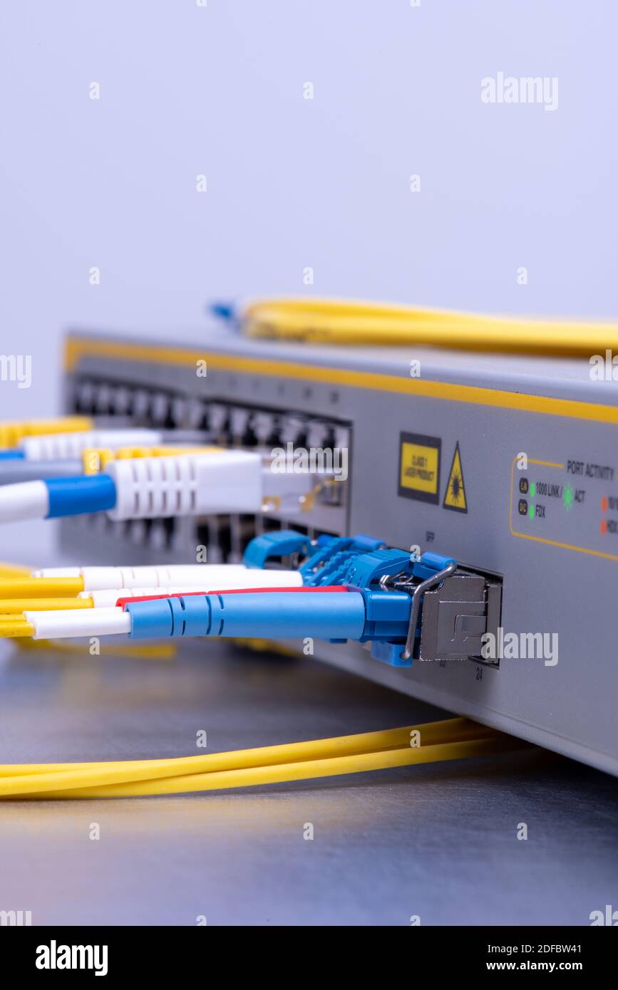 Network equipment switch with network ethernet and optical cables Stock ...