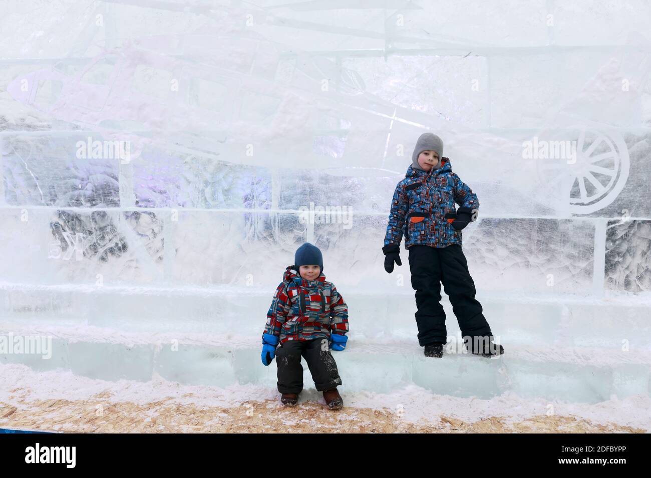 Two children playing ice hi-res stock photography and images - Alamy