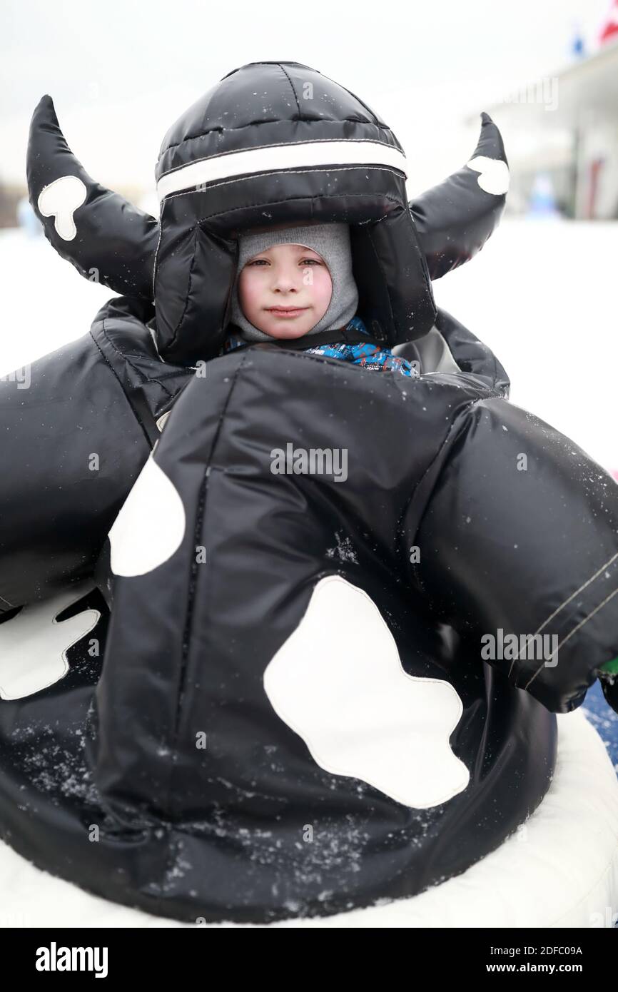 Portrait of kid in sumo suit in winter Stock Photo - Alamy