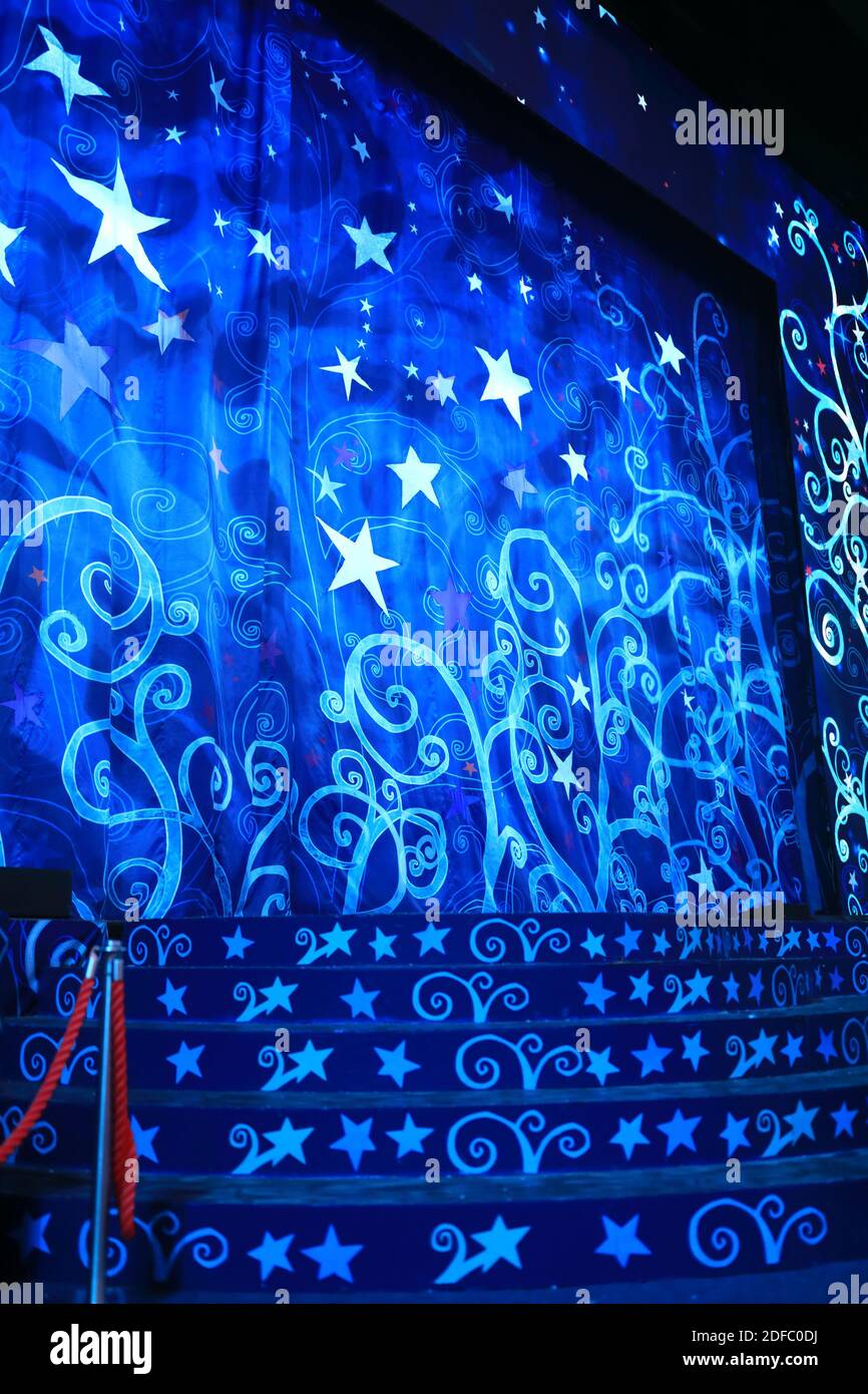 View of blue curtain in concert hall Stock Photo - Alamy