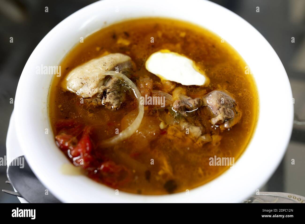 Bowl of Bozbash Armenian soup in restaurant Stock Photo - Alamy