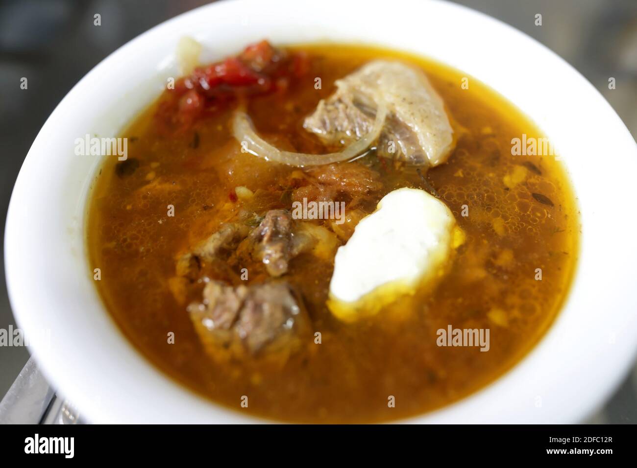 Bozbash Armenian soup with lamb meat and sour cream Stock Photo - Alamy