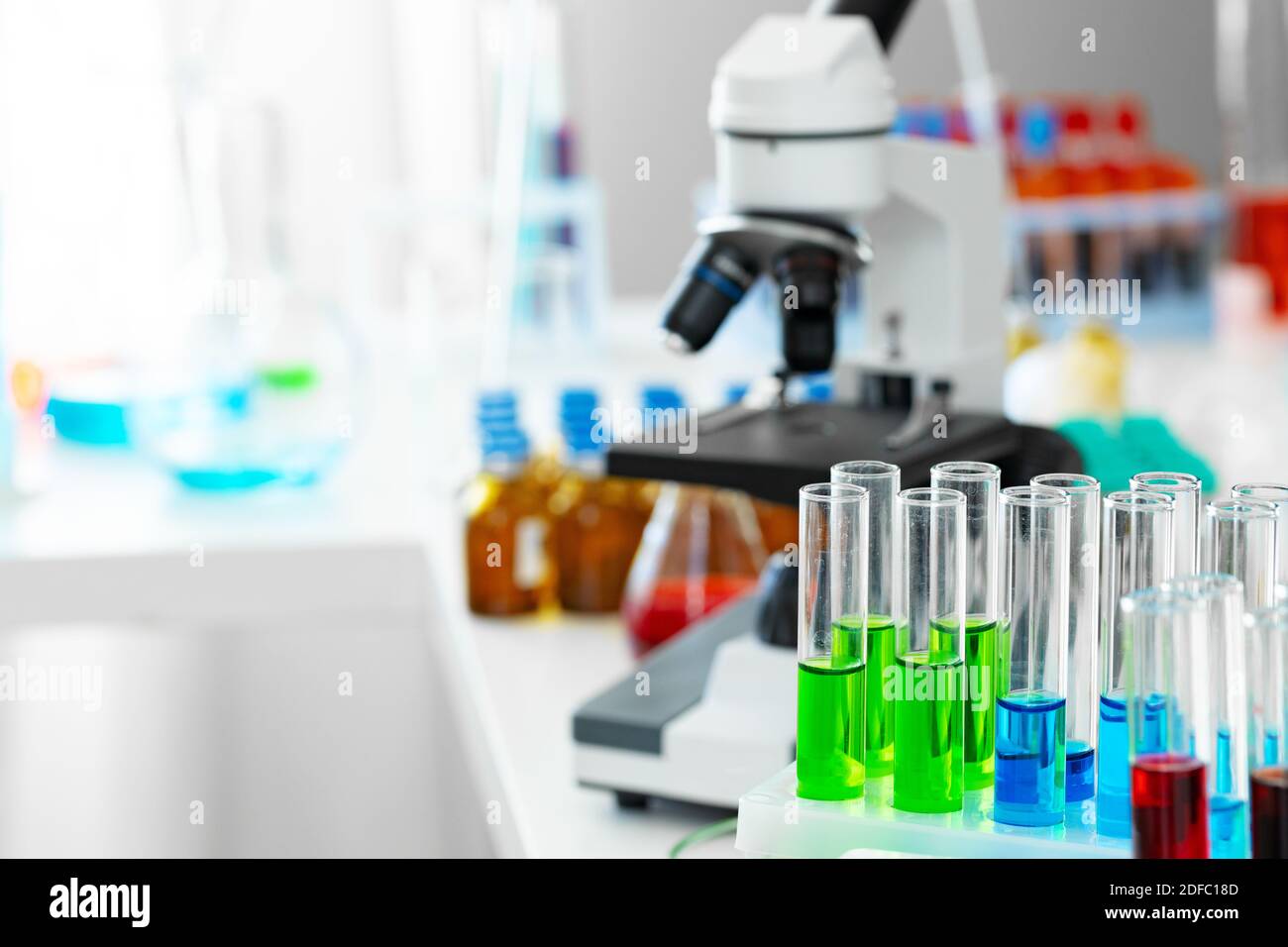 Scientific healthcare research background with microscope in medical ...
