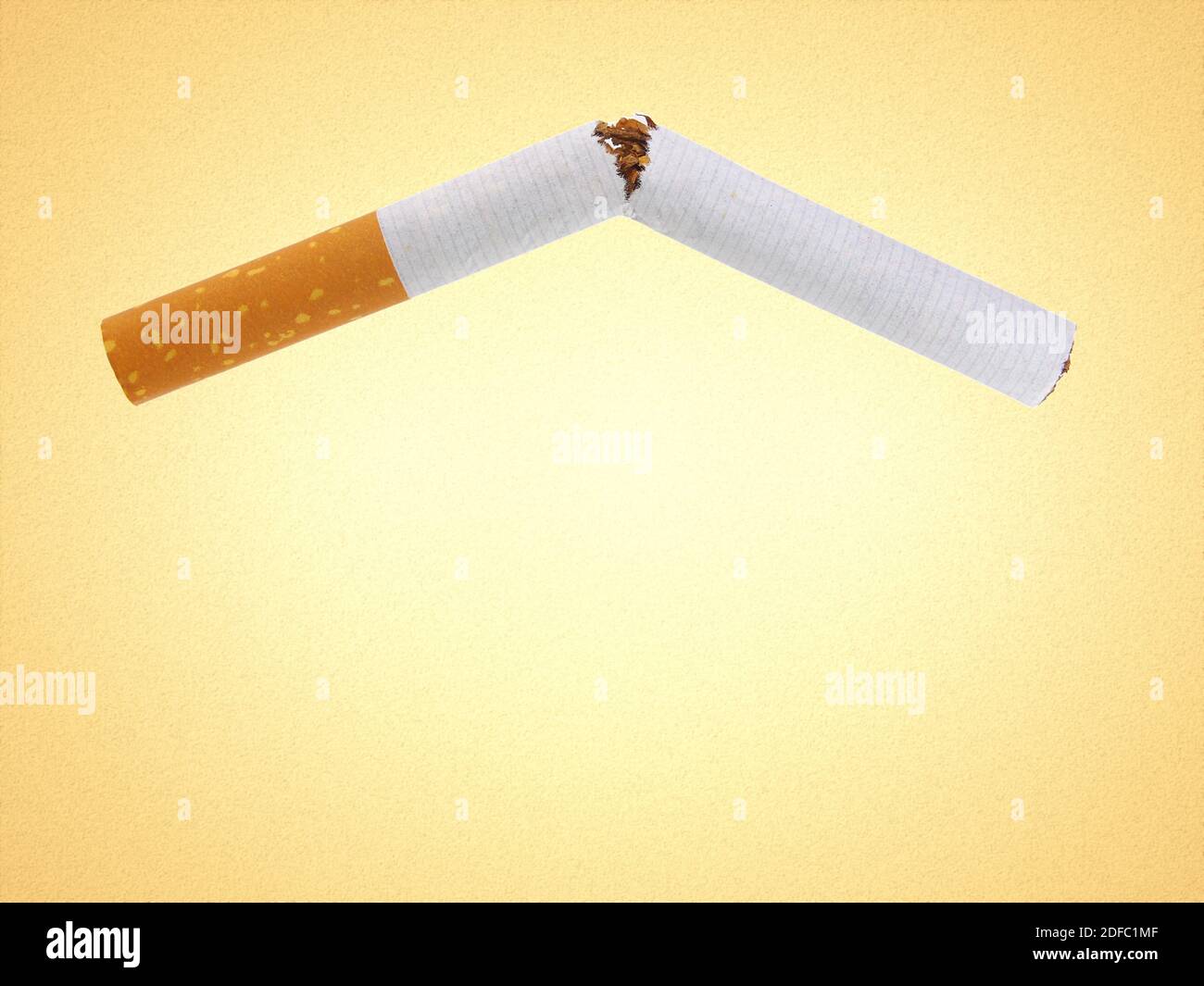 Broken cigarette background with blank copy space Stock Photo - Alamy