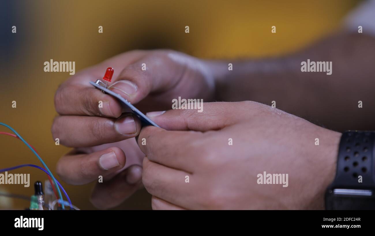 Connecting LED on PCB circuit, Red LED light Stock Photo - Alamy