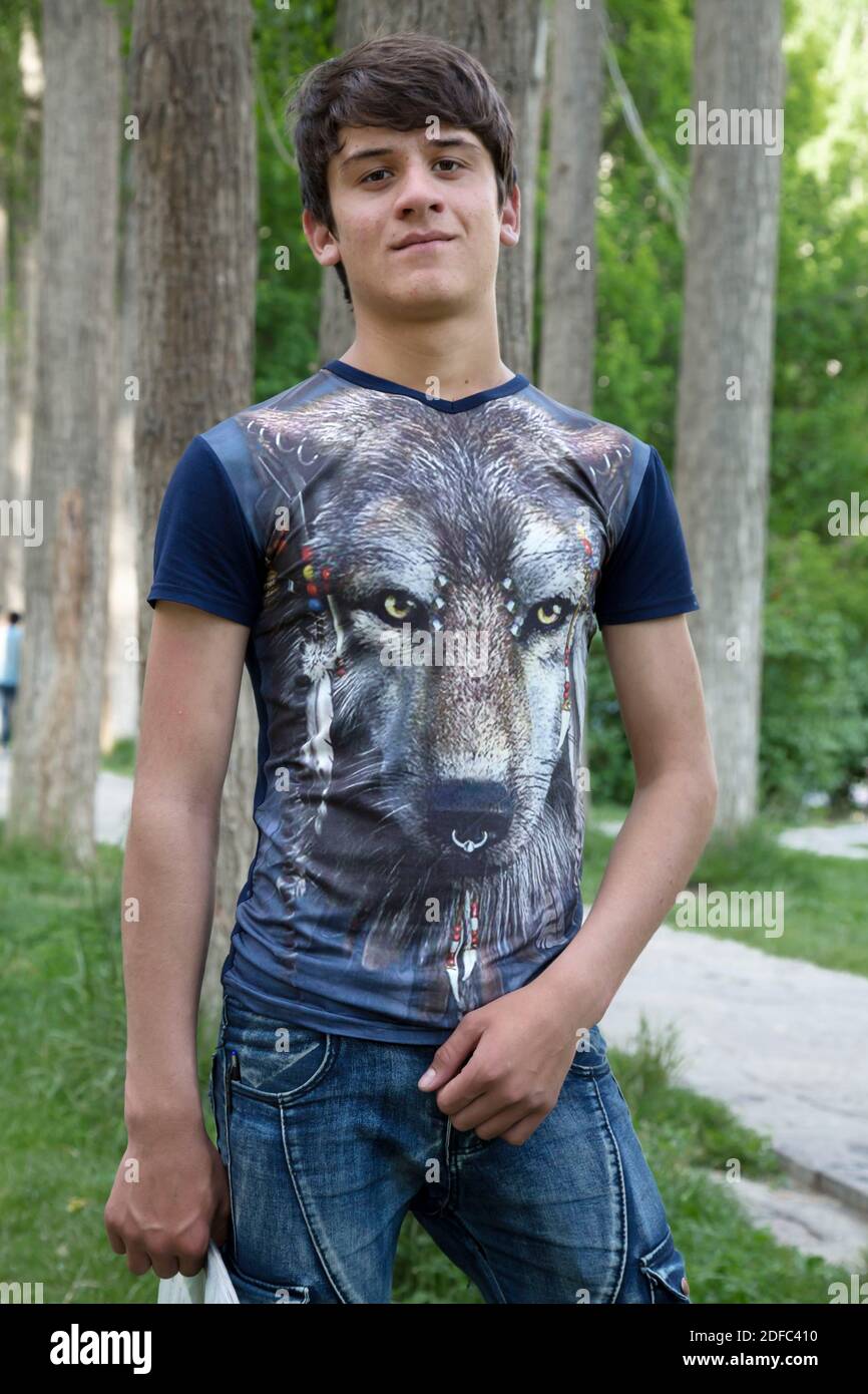Tajikistan, Gbao province, young man posing in Khorog park, portrait of ...