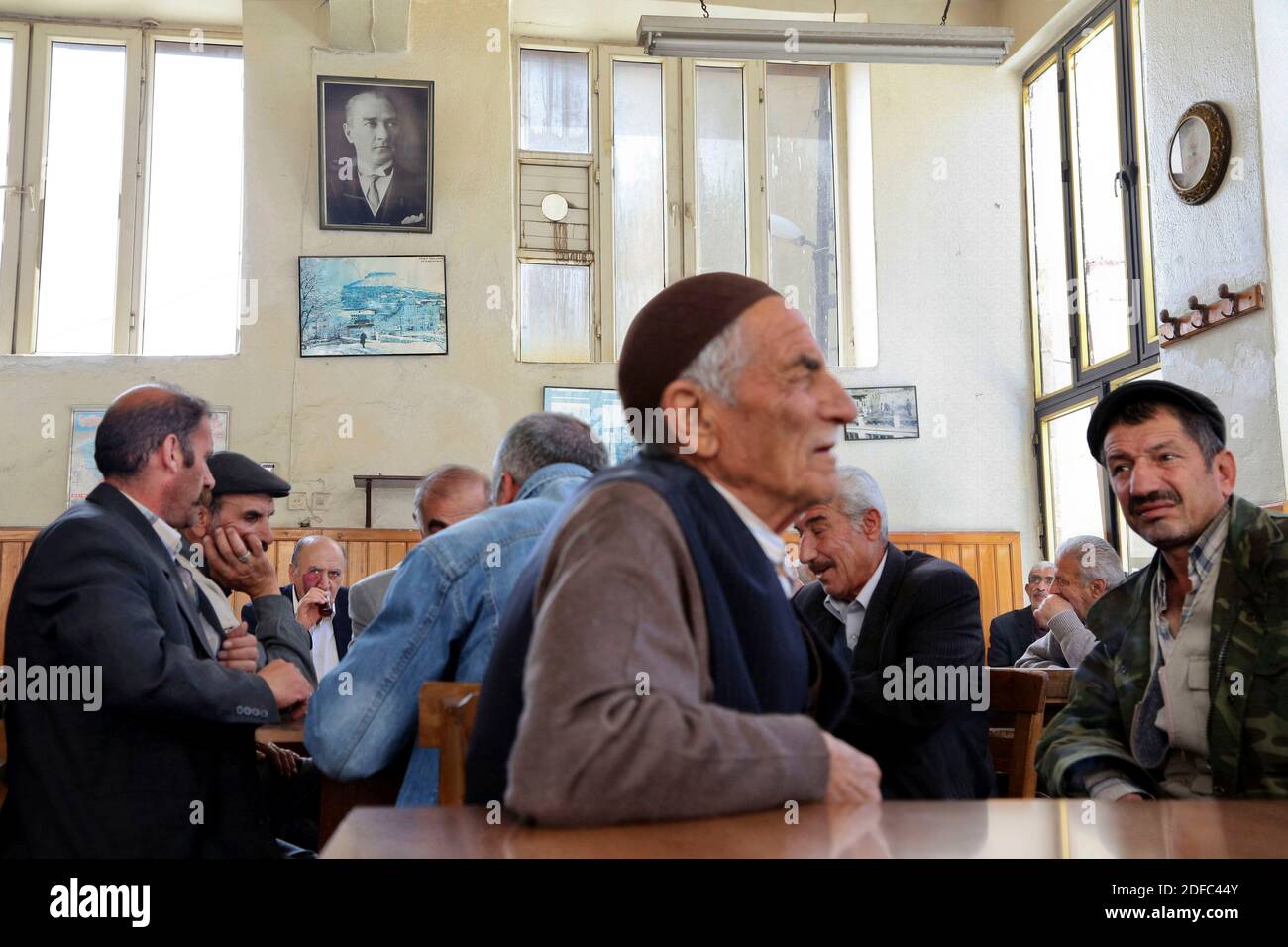 Turkey, meeting old men and playing cards at local cafe in Diyarbakir ...