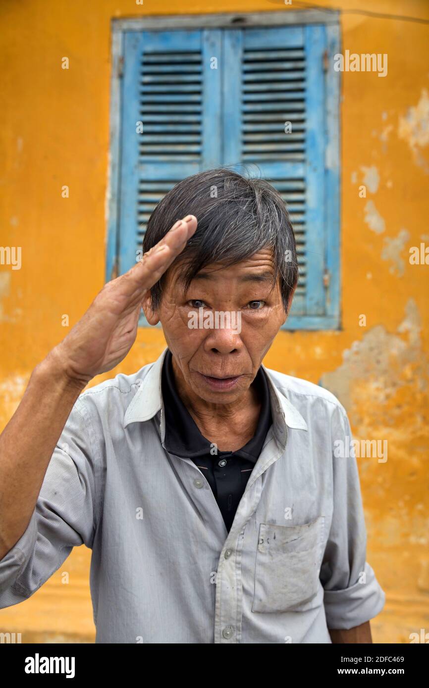 Vietnam, man in Hoi An Stock Photo - Alamy