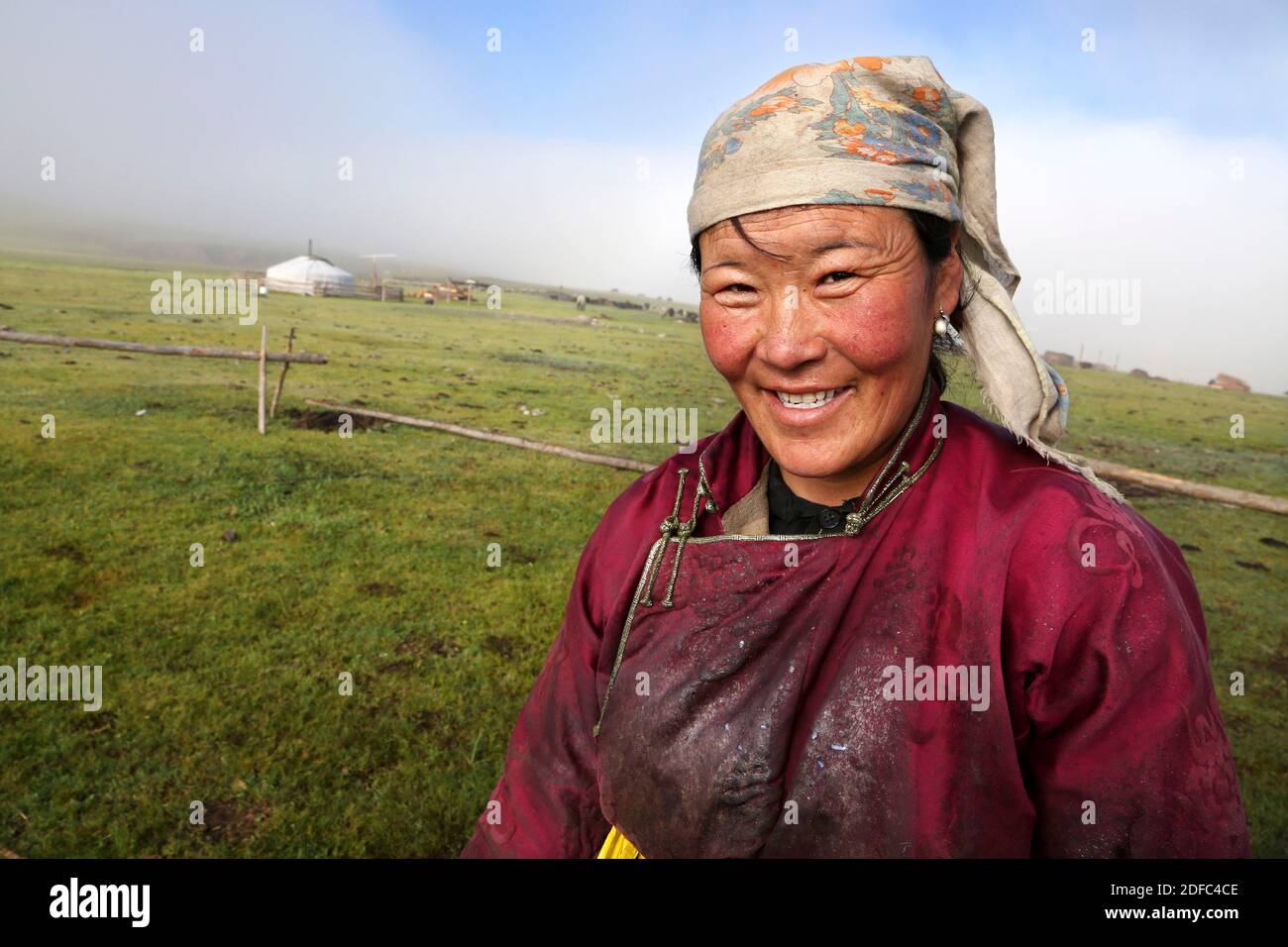 Mongolia, portrait of Mongolian woman with a traditional costume called ...