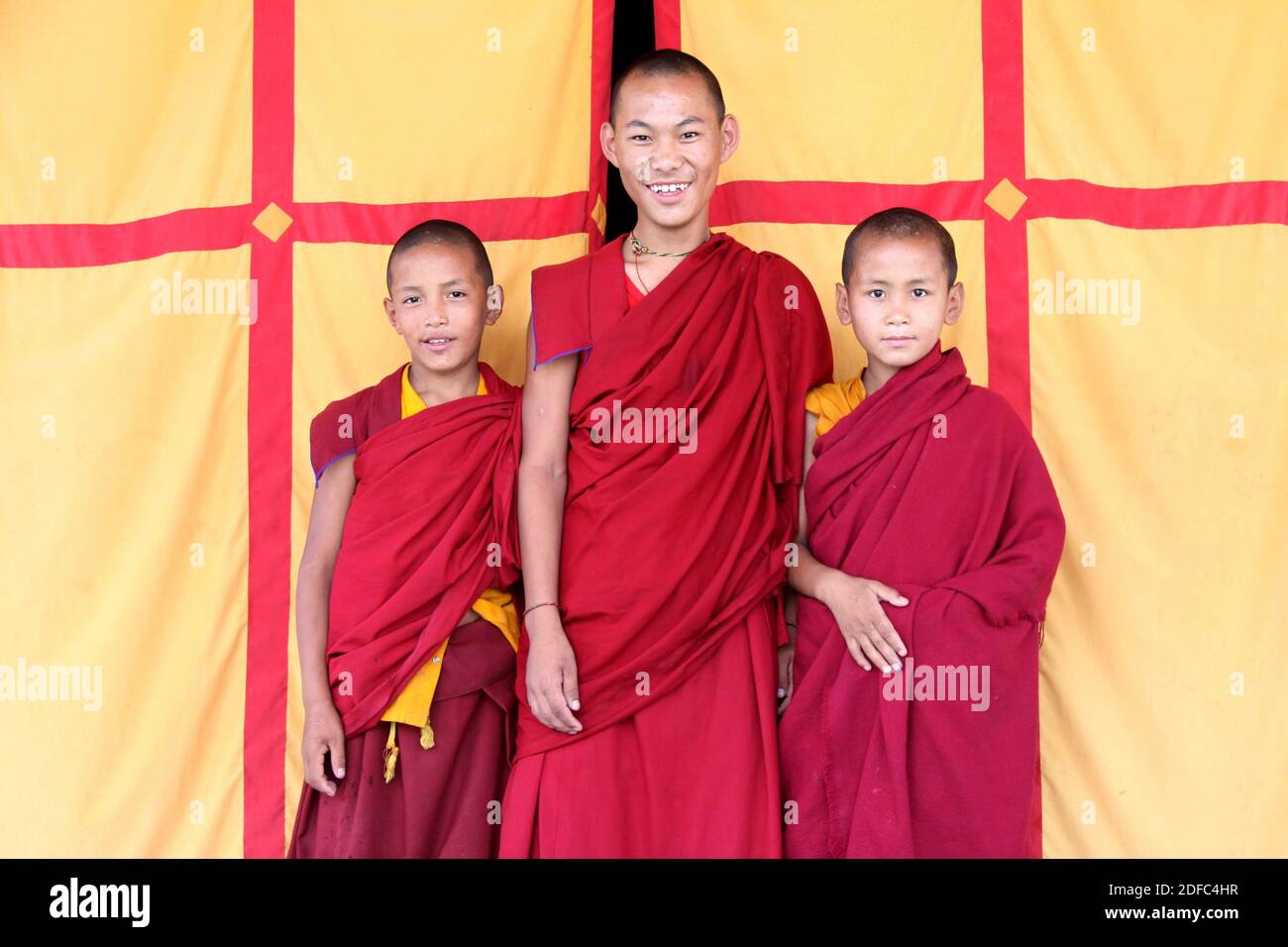 Nepal, portrait of 3 Nepalese Buddhist monks in Boudhanath Stock Photo ...