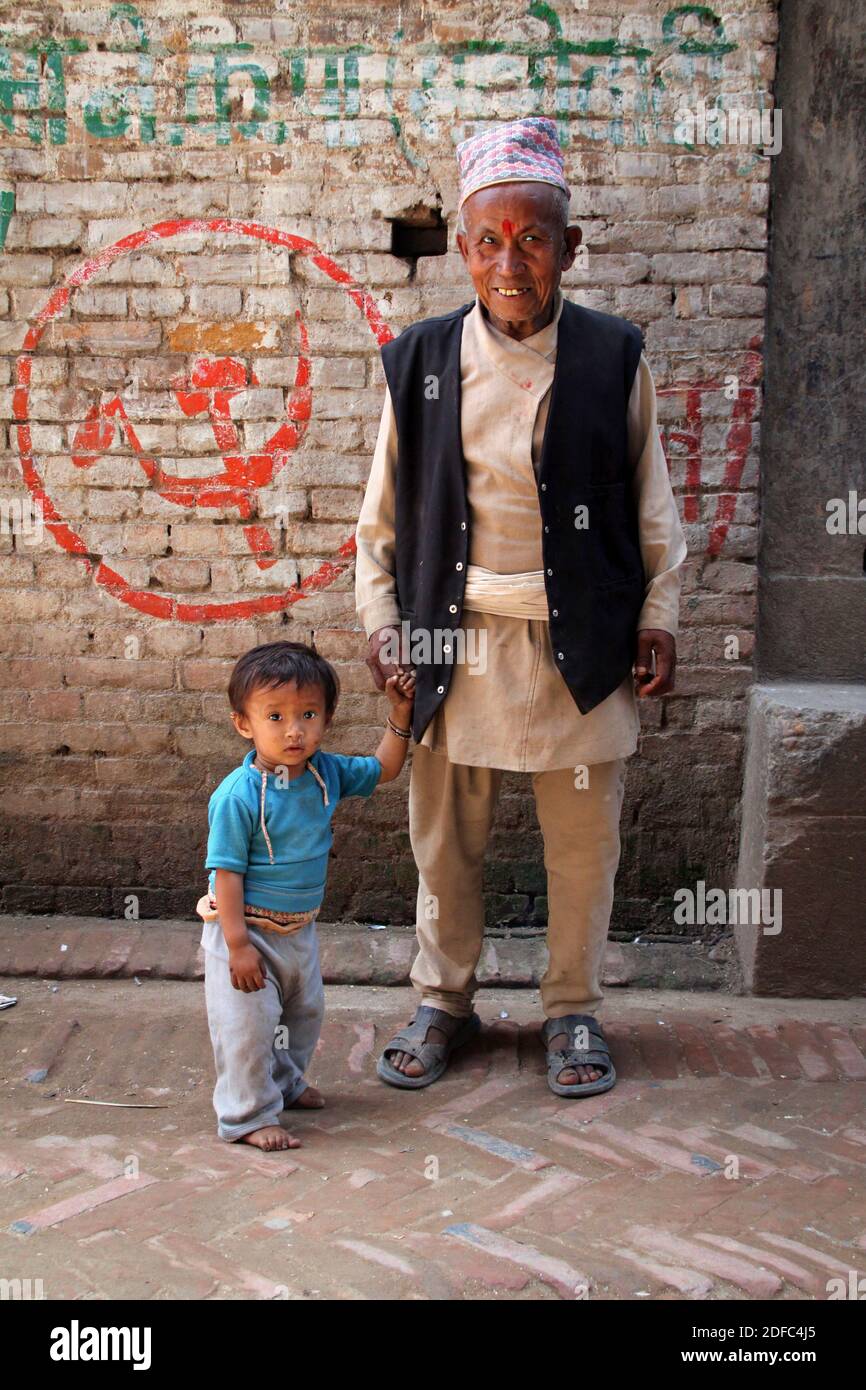 Nepal, portrait of nepalese grandfather Newar with grandson with ...
