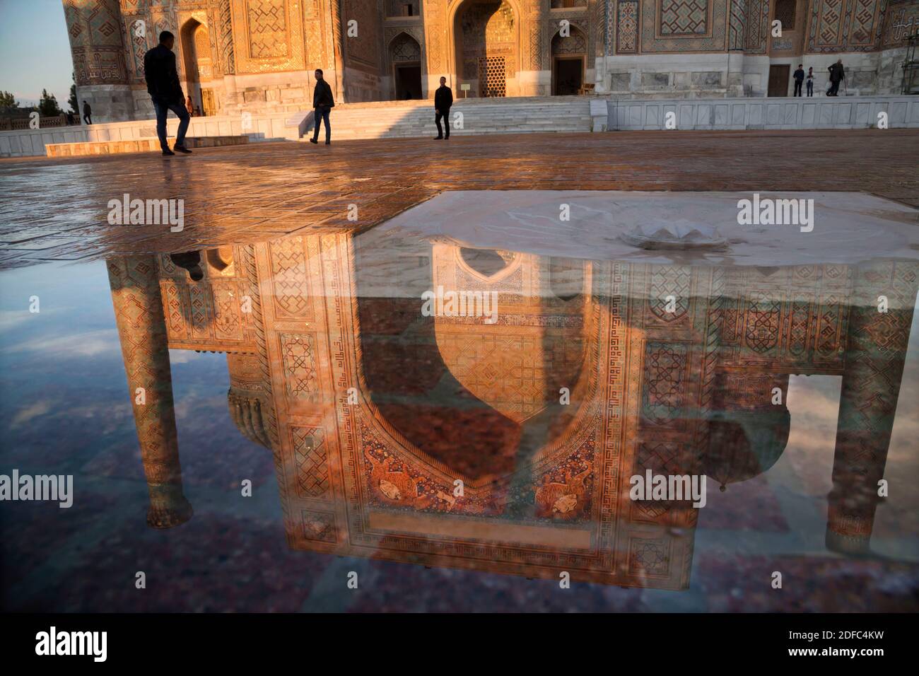 Uzbekistan, Samarkand, water reflection of the architecture of the ...