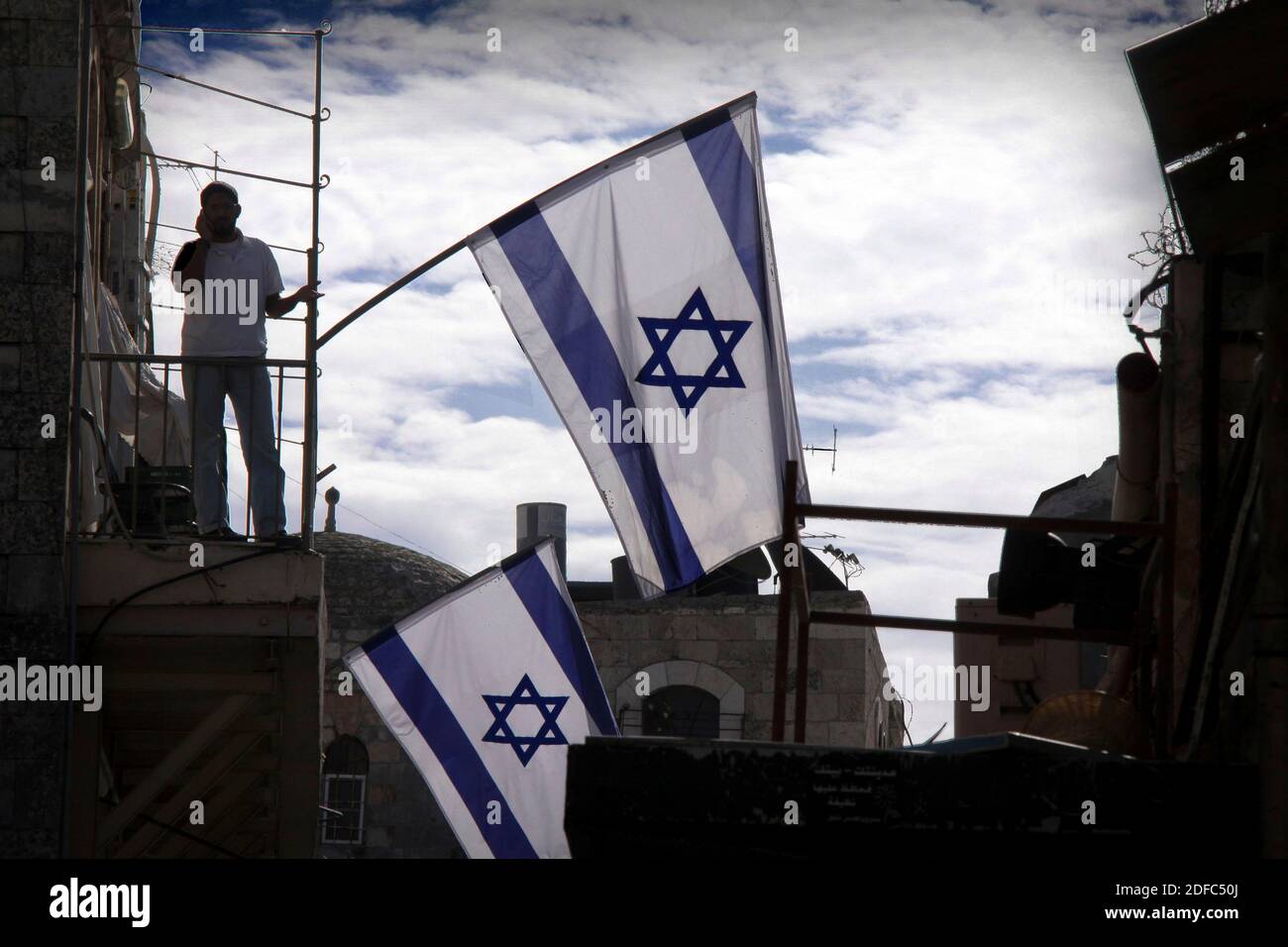 Israel, Israeli national flag in the old city of Jerusalem Stock Photo ...