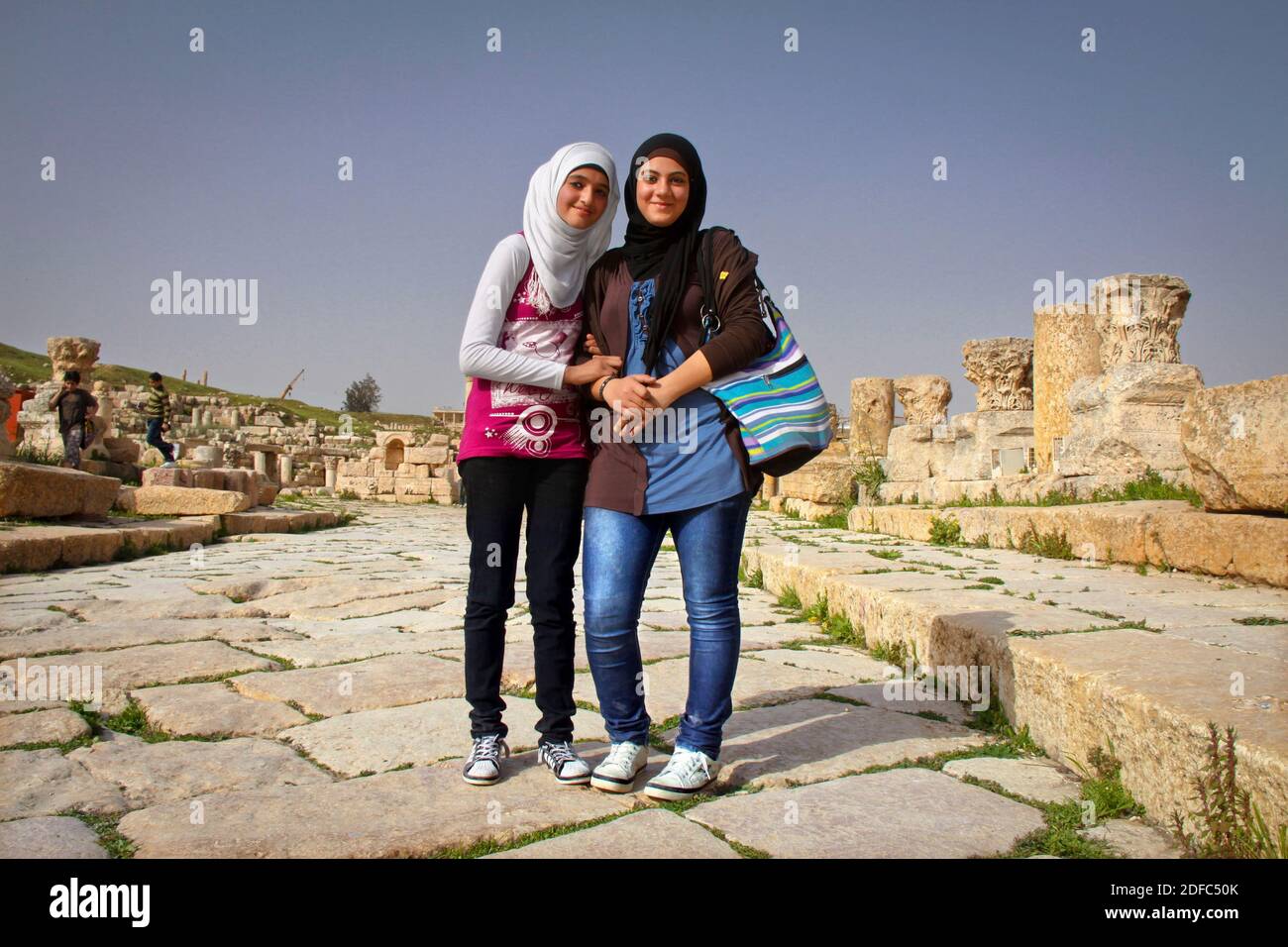 Jordan, two Jordanian teenagers on the Jerash site Stock Photo - Alamy