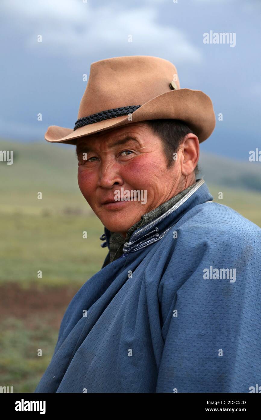 Mongolia, portrait of man with hat and deel Stock Photo - Alamy
