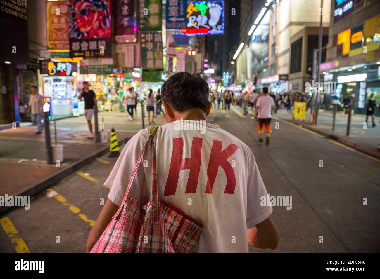 China, Hong Kong, Kowloon, man seen from behind in the street Stock ...