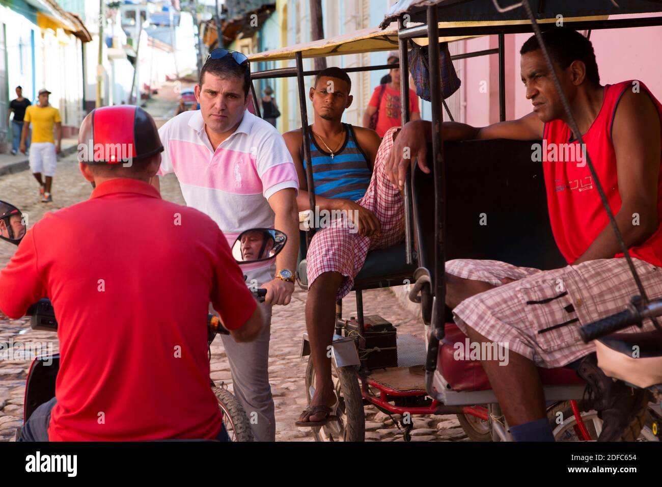 Cuba, taxi drivers on a street in Trinidad Stock Photo - Alamy