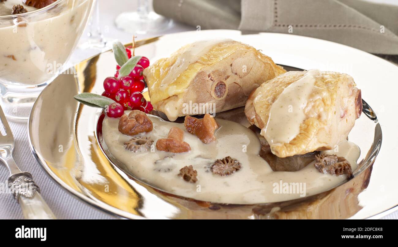 Capon braised in morel juice Stock Photo - Alamy