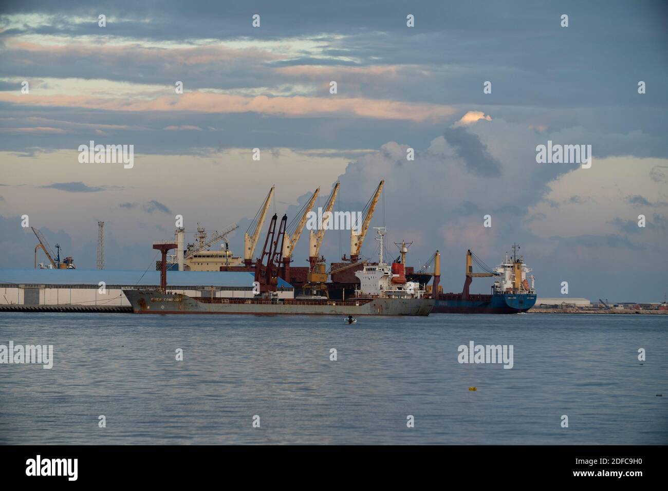Tripoli, Libya - November 25, 2020: Container ships with loading cranes ...