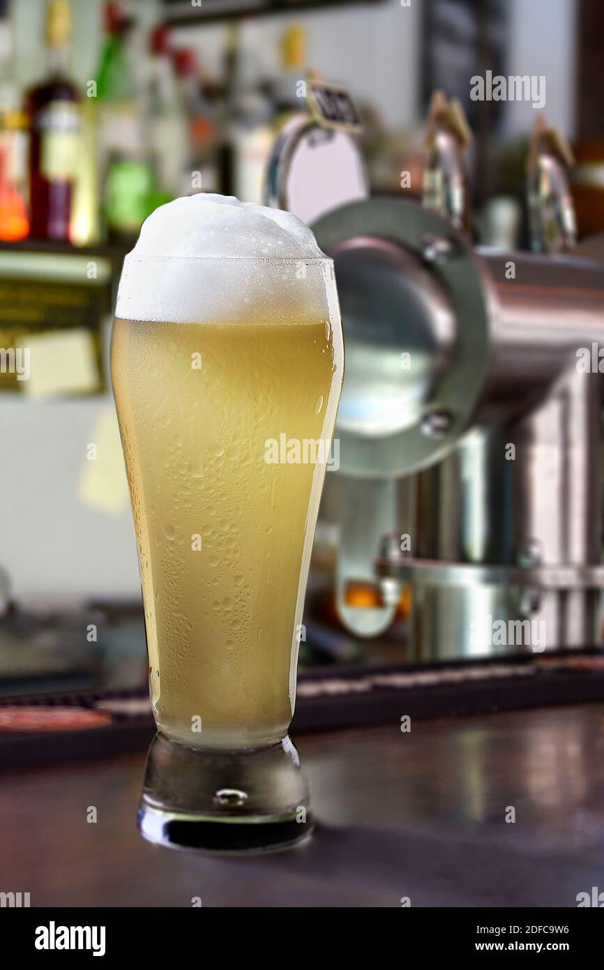 Glass of white abbey beer Stock Photo - Alamy