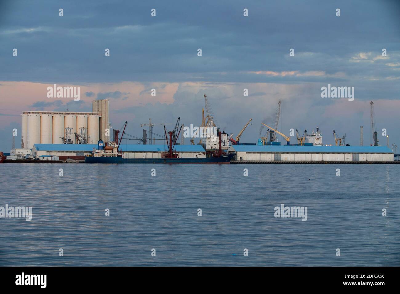 Tripoli, Libya - November 25, 2020: Container ships with loading cranes ...