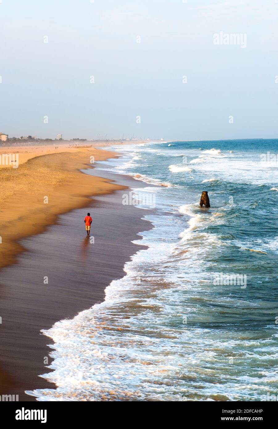 Togo, Lom?, man on the beach Stock Photo - Alamy