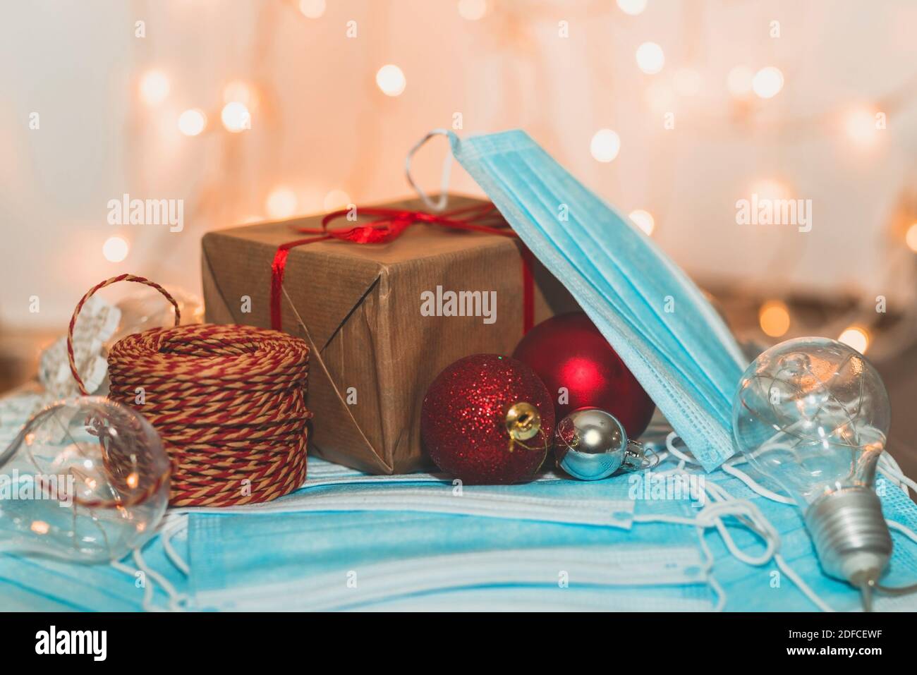 Christmas gift box, red packing string decorated with light bulbs ...