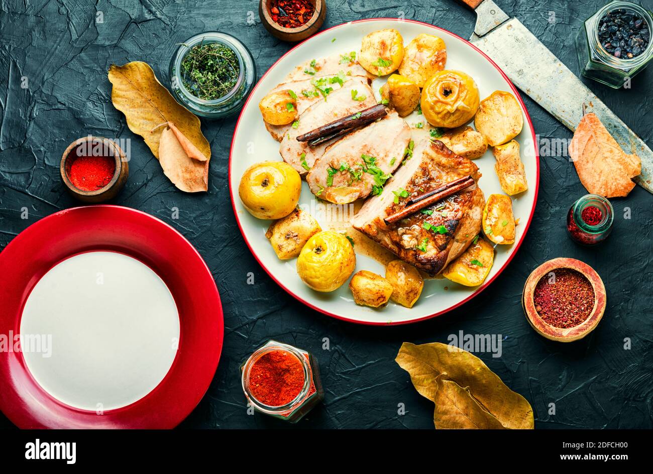 Baked meat with apples.Fried pork loin stuffed with apple Stock Photo ...