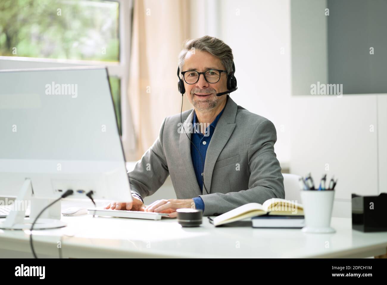 Confident Senior Man Video Conference Chat Portrait Stock Photo - Alamy