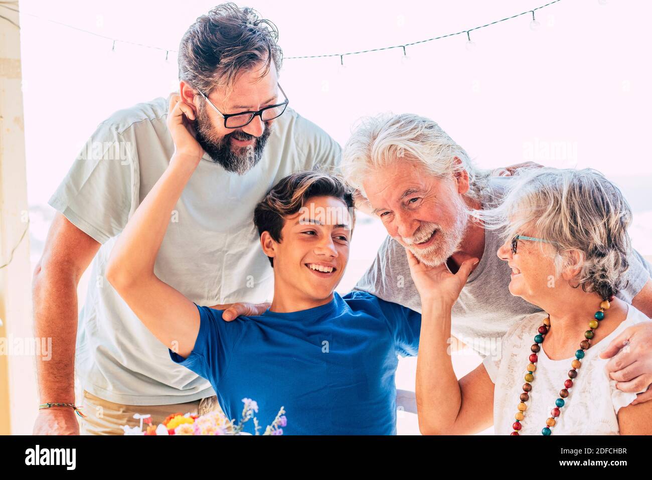 Group of caucasian family people all together have fun and enjoy mixed ...