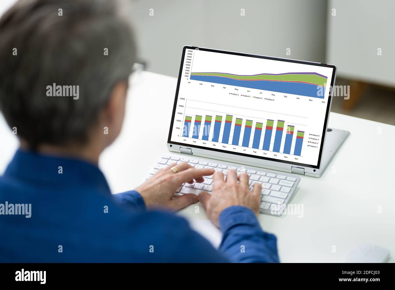 Convertible Laptop Screen Graph. Business Analyst Man Stock Photo - Alamy