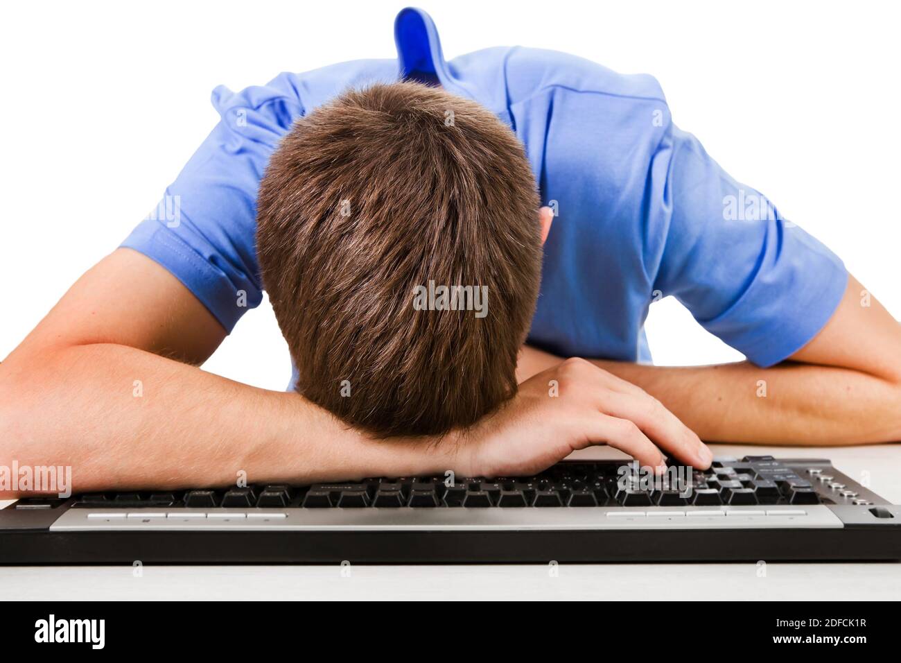 Tired Man sleep on the Computer Keyboard on the White Background Stock ...
