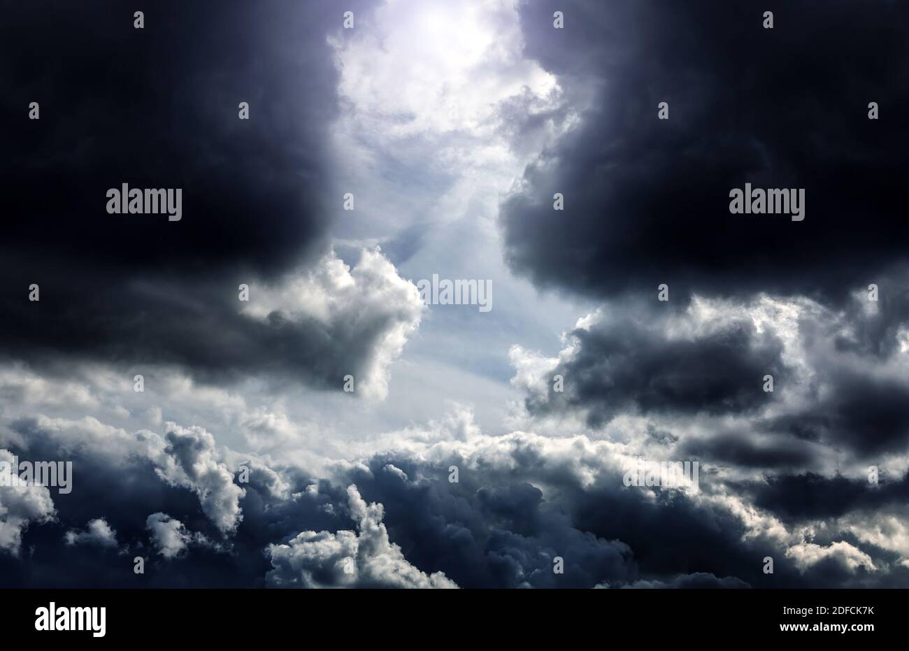 Light in the Dark and Dramatic Storm Clouds Stock Photo - Alamy