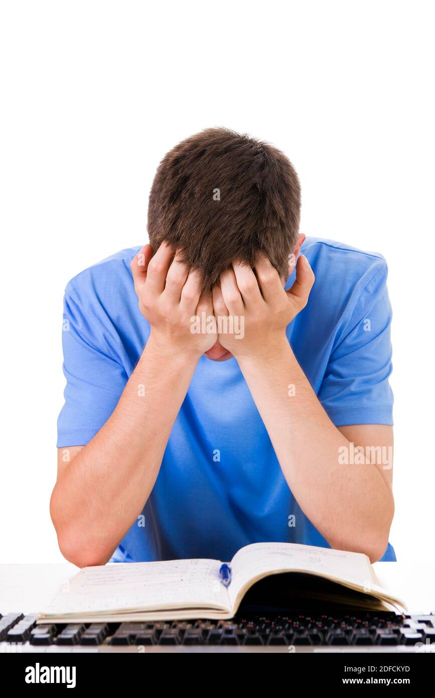 Sad Man with a Computer Keyboard on the White Background Stock Photo ...
