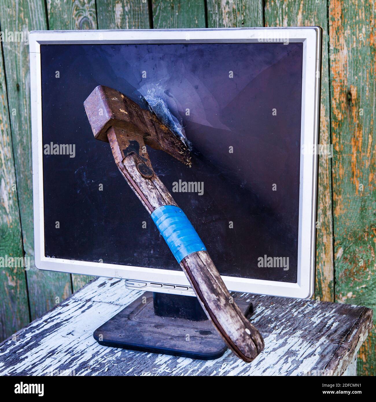 Axe to Smash a Computer Screen on the Old Planks Background Stock Photo ...