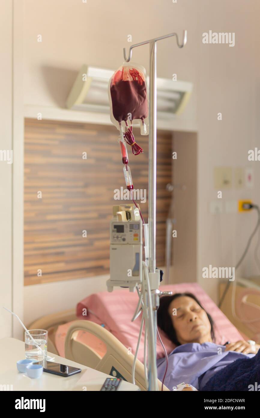 Old woman patients hand have a blood transfusion in the hospital Stock ...