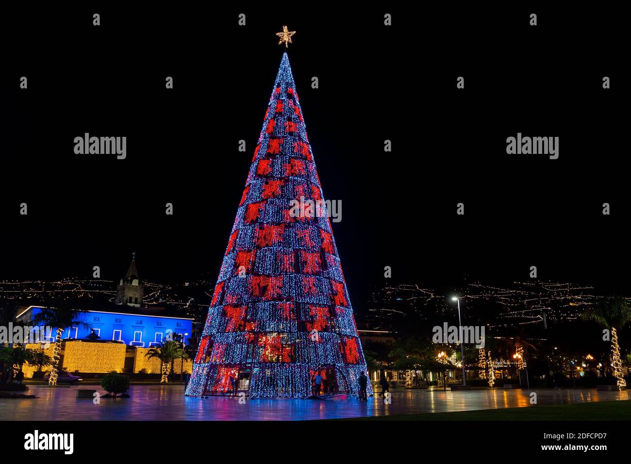 FUNCHAL, PORTUGAL - DECEMBER 4, 2020: Colorful Christmas tree at center ...