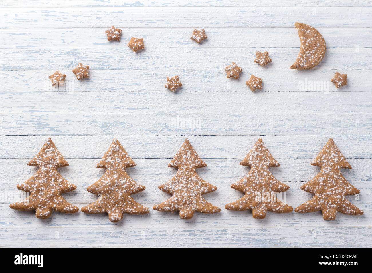 Oatmeal gingerbread cookies in the shape of Christmas tree sprinkled ...