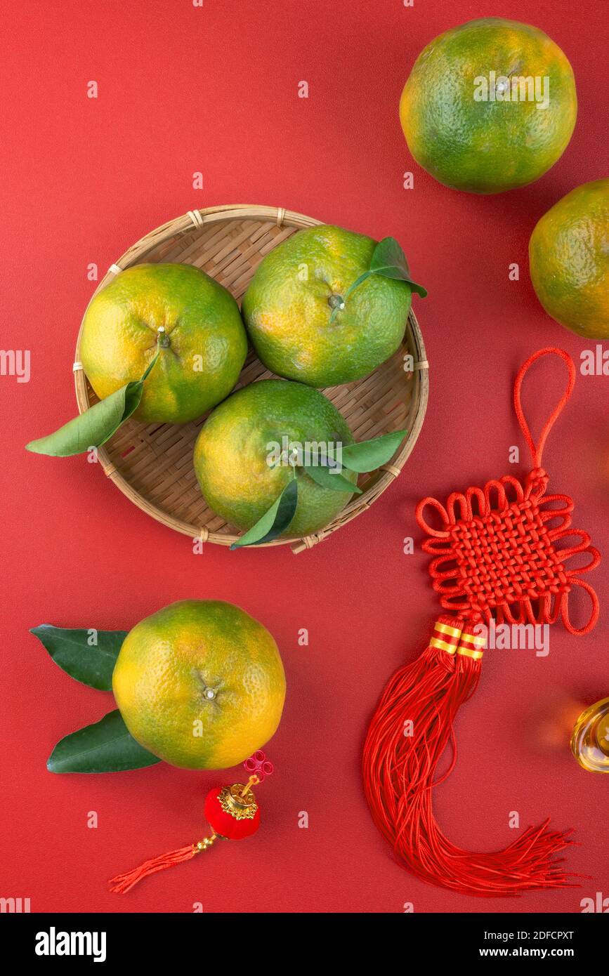 Top view of fresh ripe tangerine mandarin orange with fresh leaves on ...