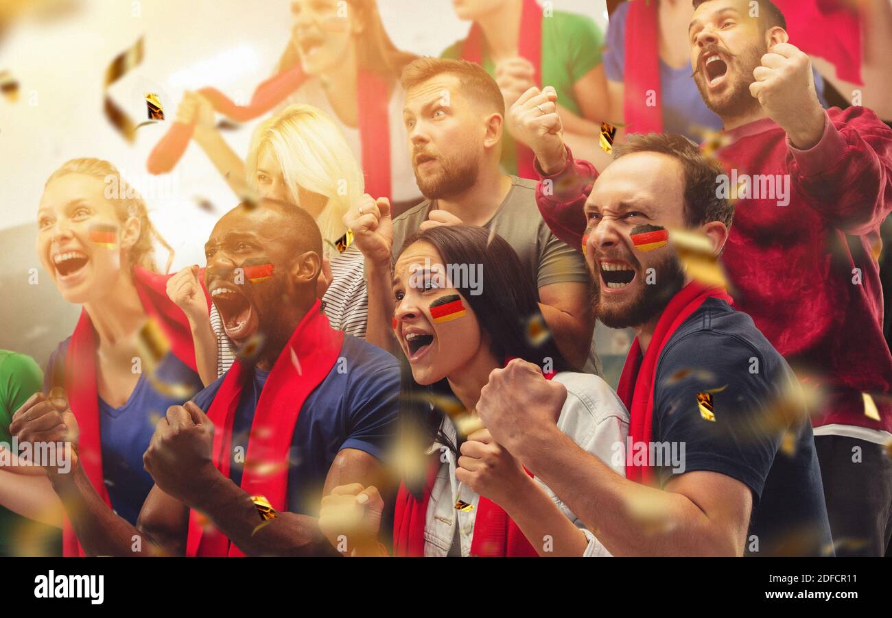 Group of happy fans cheering for their team victory. Male and female ...
