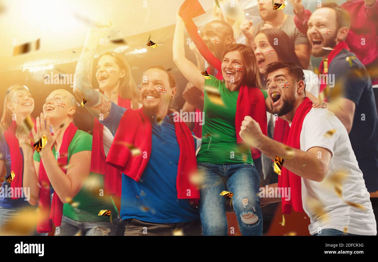 Group of happy fans cheering for their team victory. Male and female ...