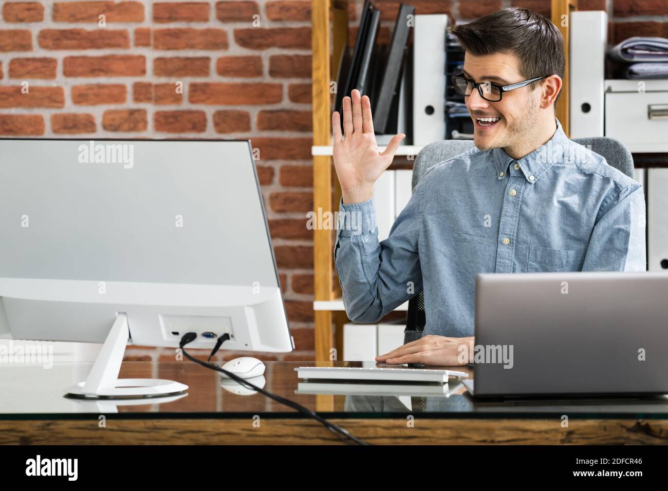 Man raising hand using hi-res stock photography and images - Alamy