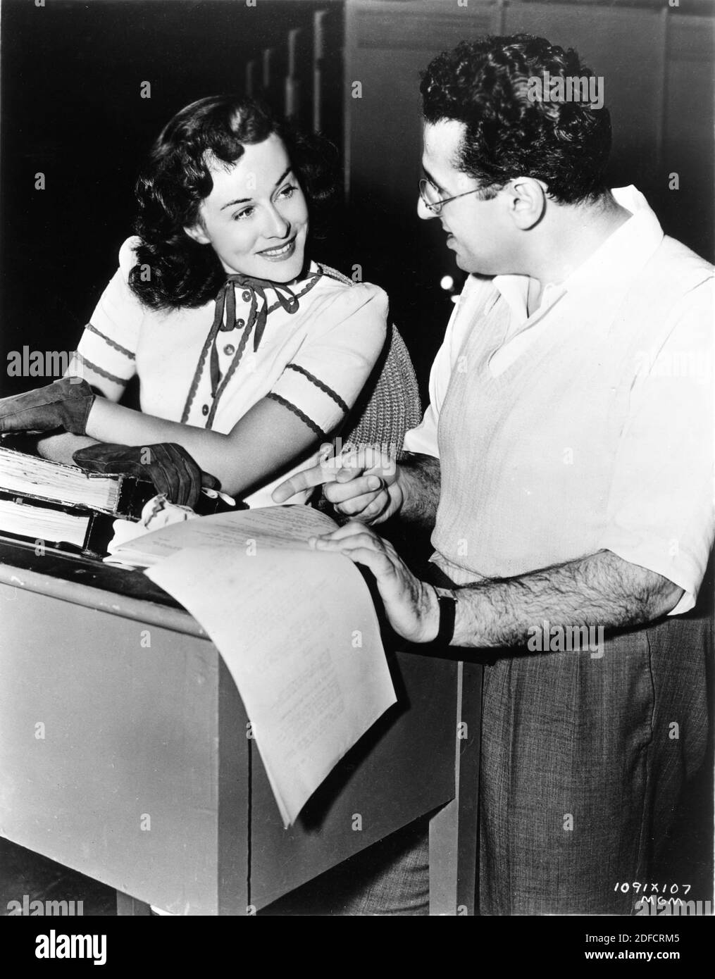 PAULETTE GODDARD and Director GEORGE CUKOR on set candid during filming ...