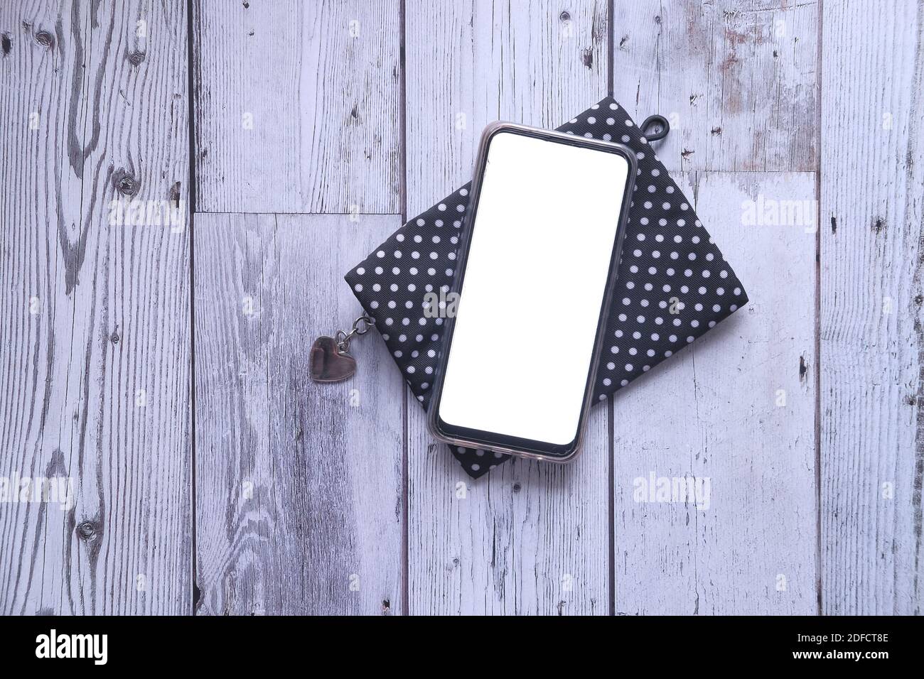 smart phone with empty screen on notepad Stock Photo - Alamy
