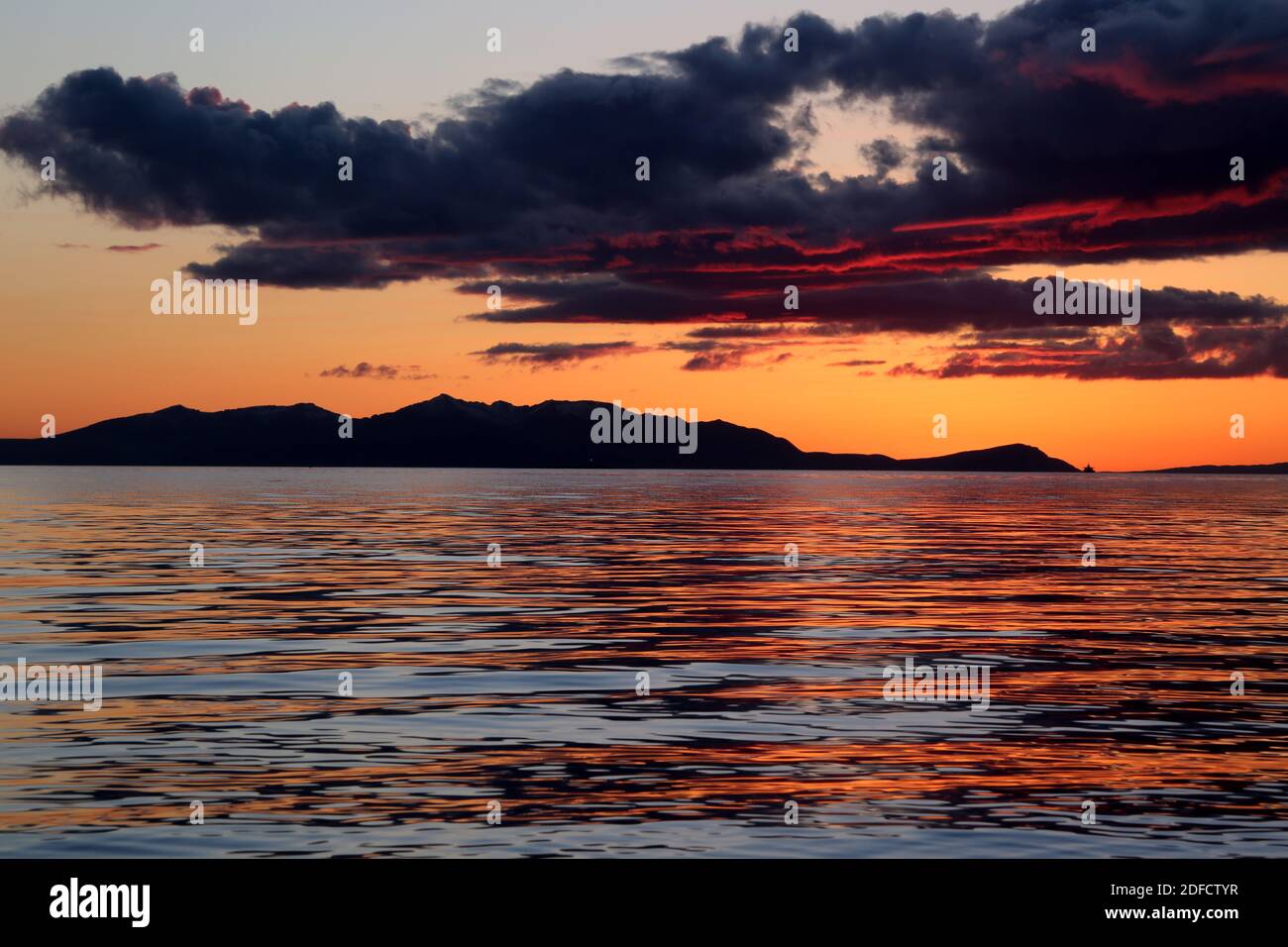 Sunset over Arran from Prestwick Beach. Ayrshire, Scotland, UK ...