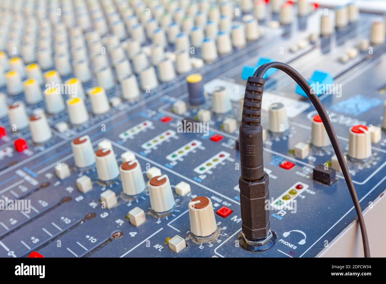 Sound studio adjusting record equipment, music mixer Stock Photo - Alamy