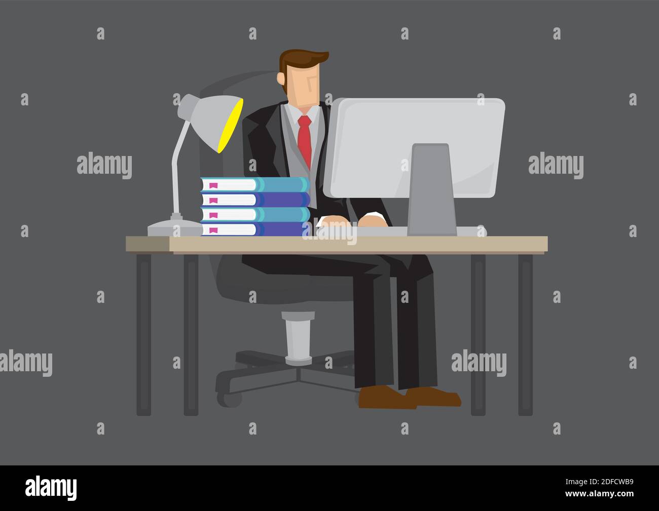 Business man in a suit working on a laptop computer at his office desk ...