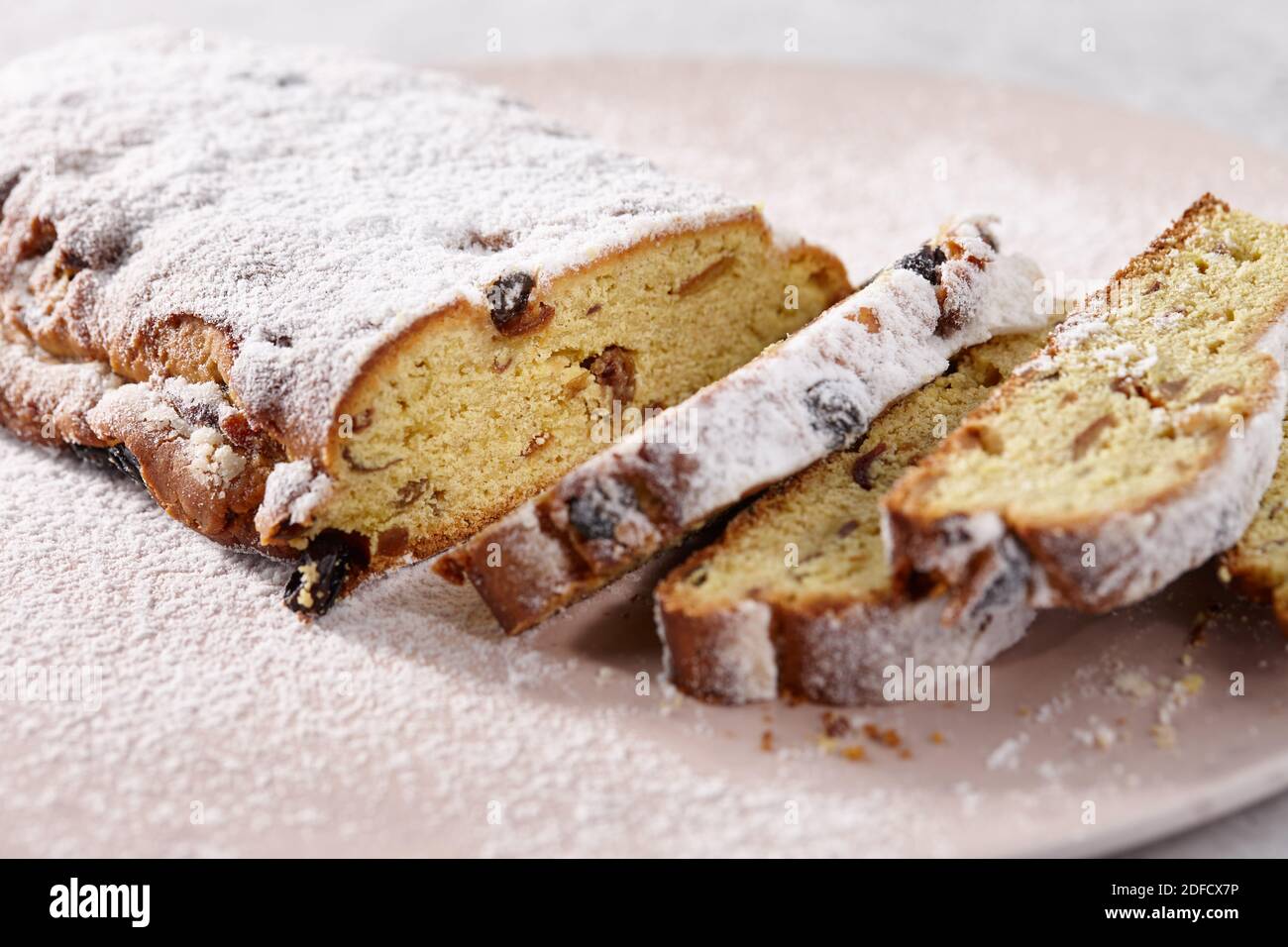 Traditional Christmas stollen dessert with candied fruit. Holiday ...