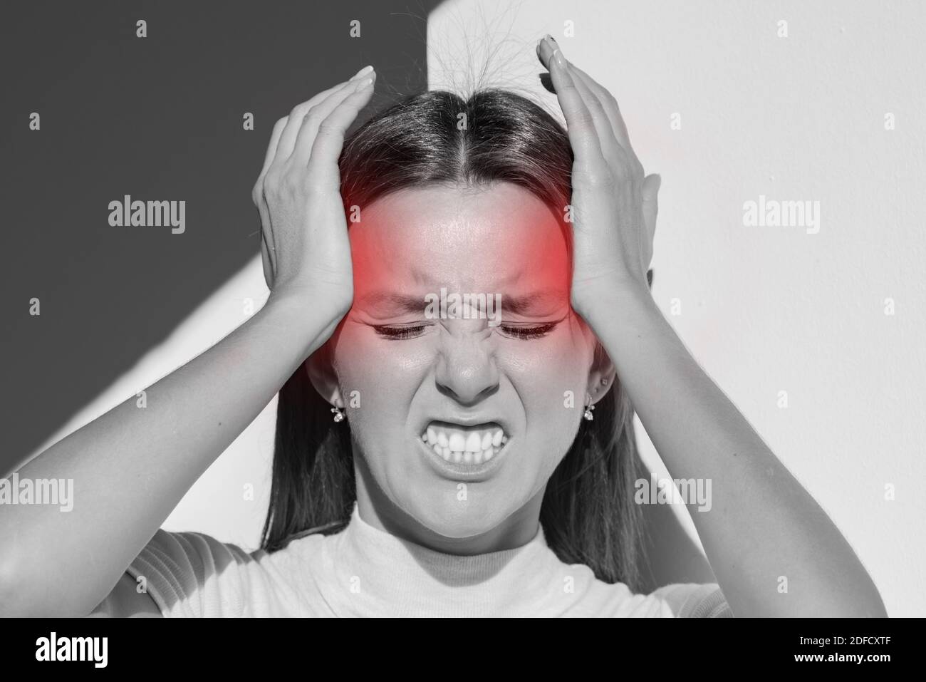 Woman touching her temples, having strong headache. Cluster headache ...